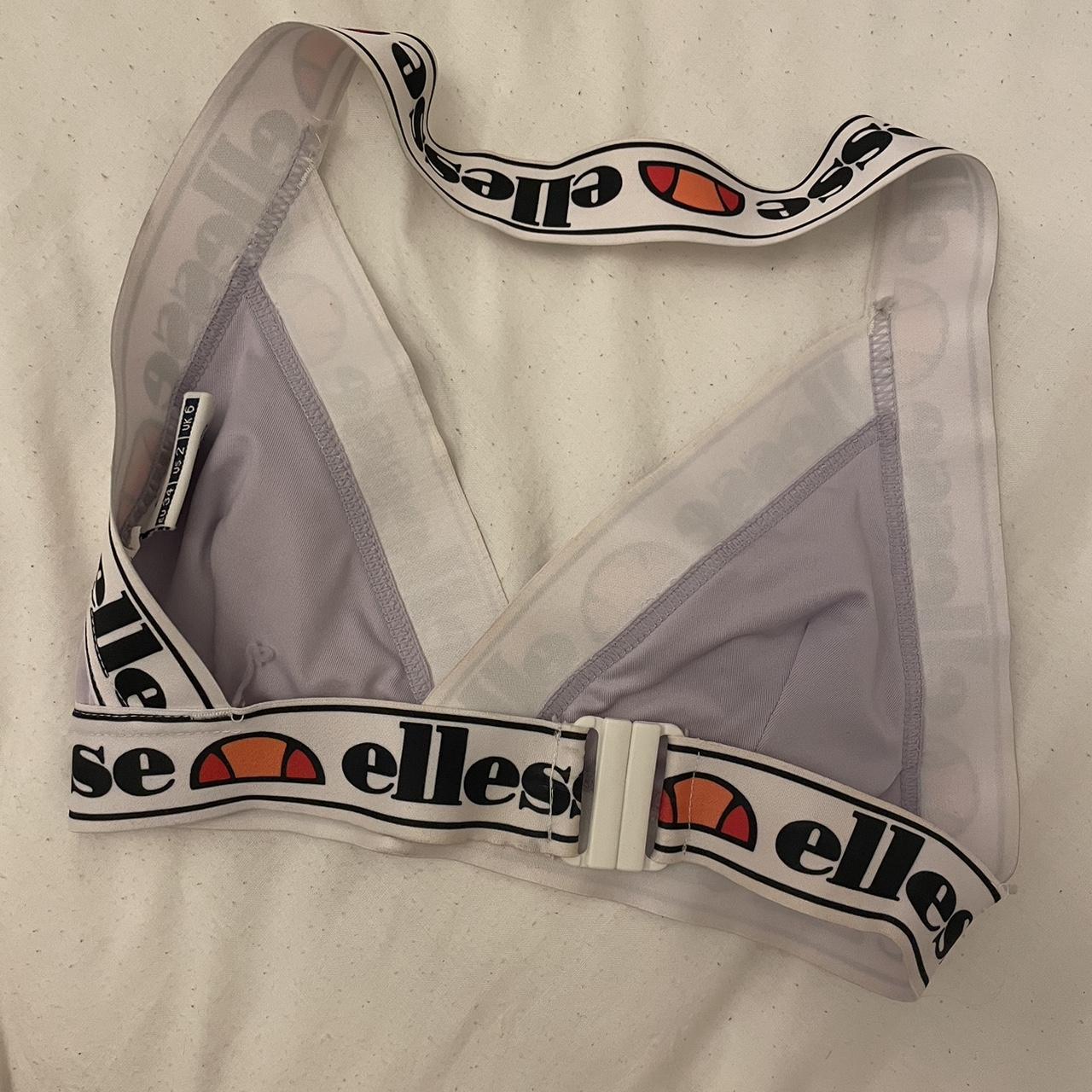 Lilac Ellesse bikini top with white branded... - Depop