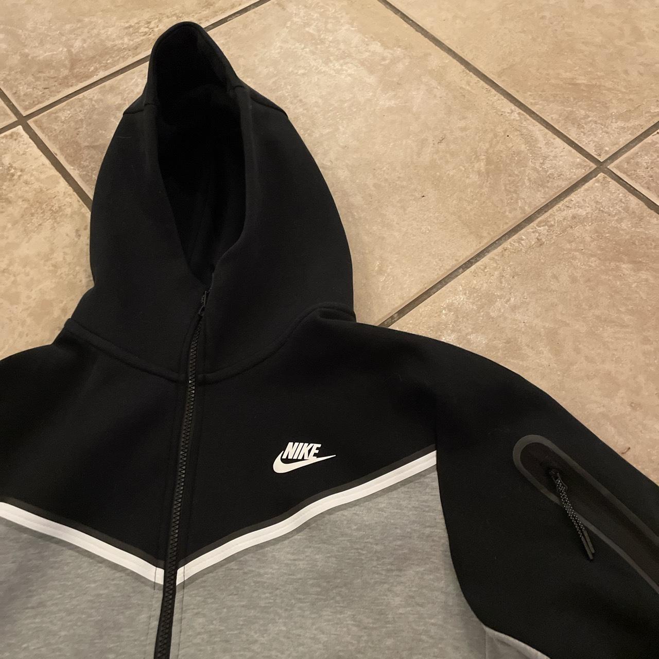 Nike Tech Large Rip in pocket - Depop