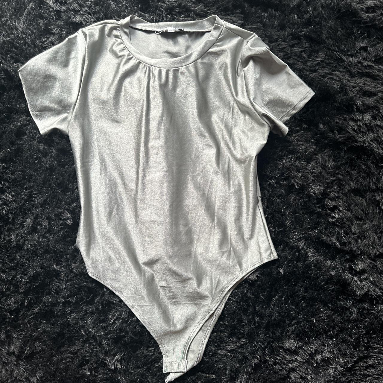 Fashionnova Silver/Metallic bodysuit worn once - Depop