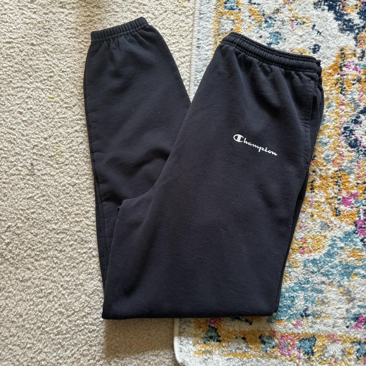 Black champion sweat pants Tagged... - Depop