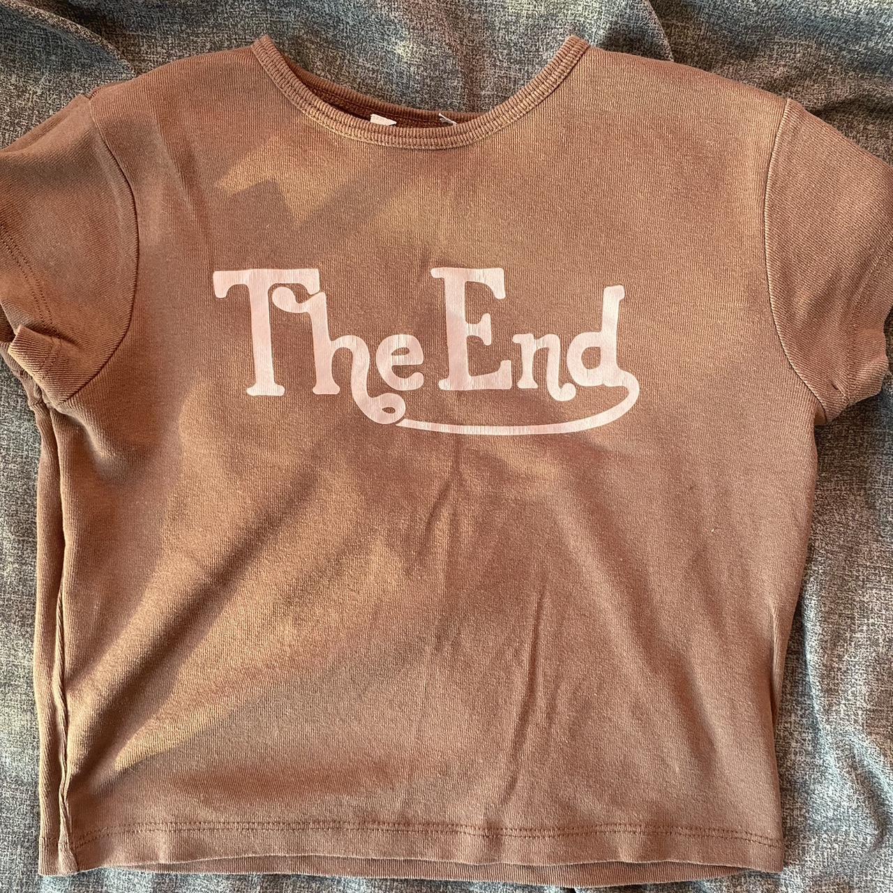 rare subdued top with a graphic writingg!! super... - Depop