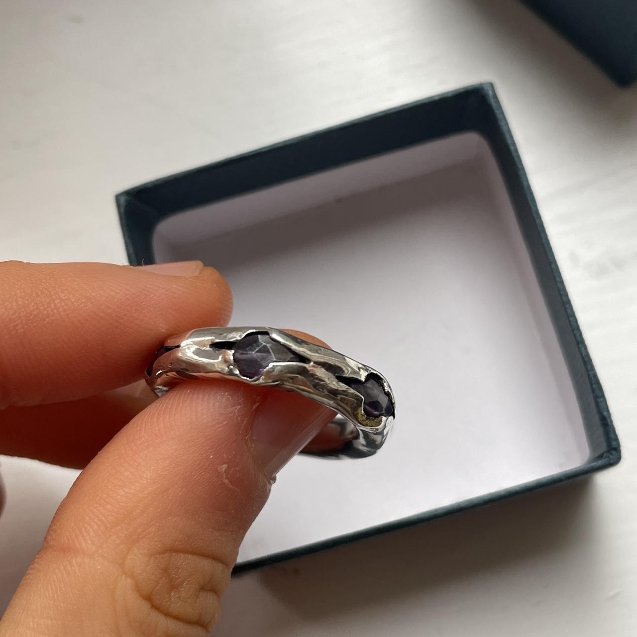 Very cool sterling silver ring set with purple... - Depop