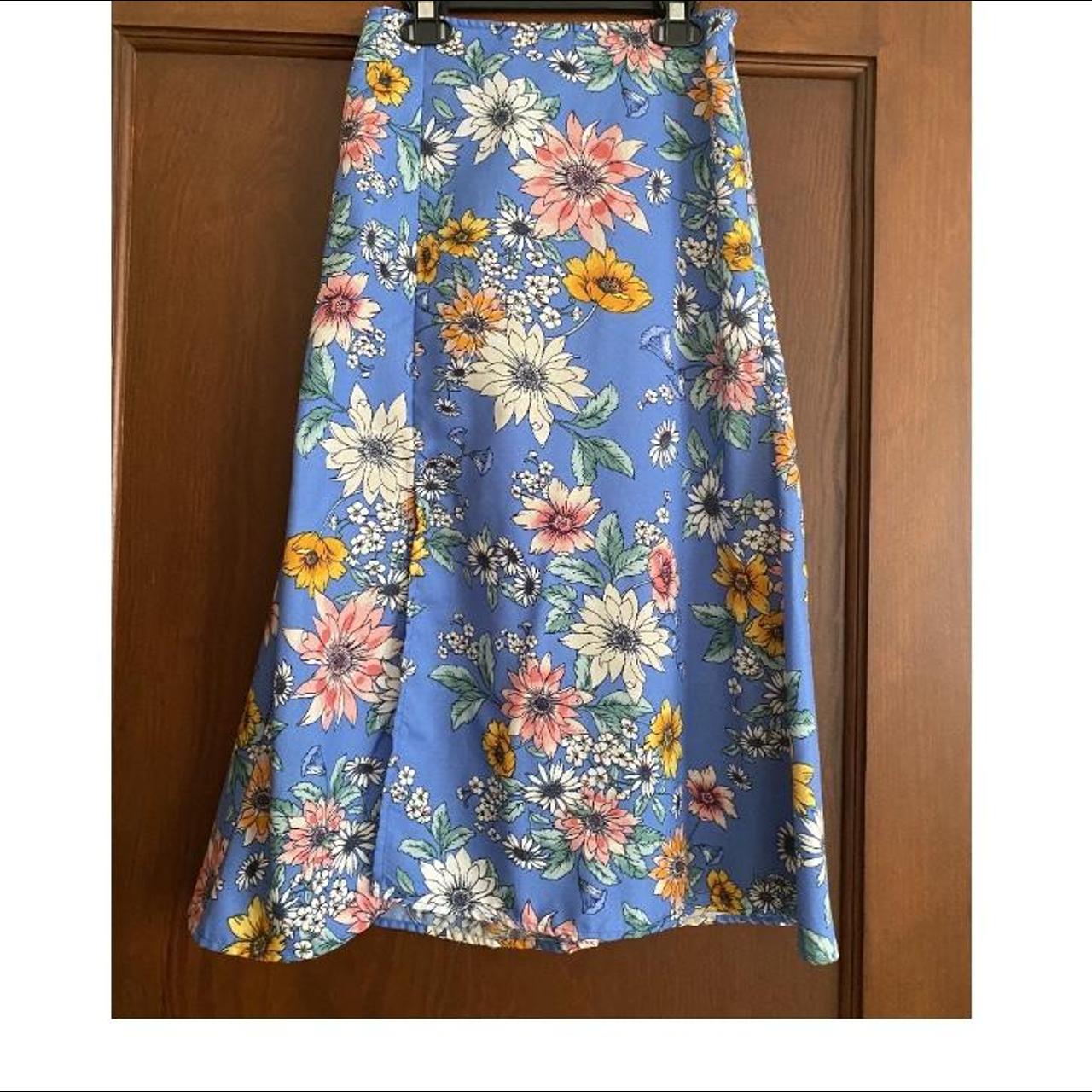 Floral skirt mid shin length in excellent condition.... - Depop