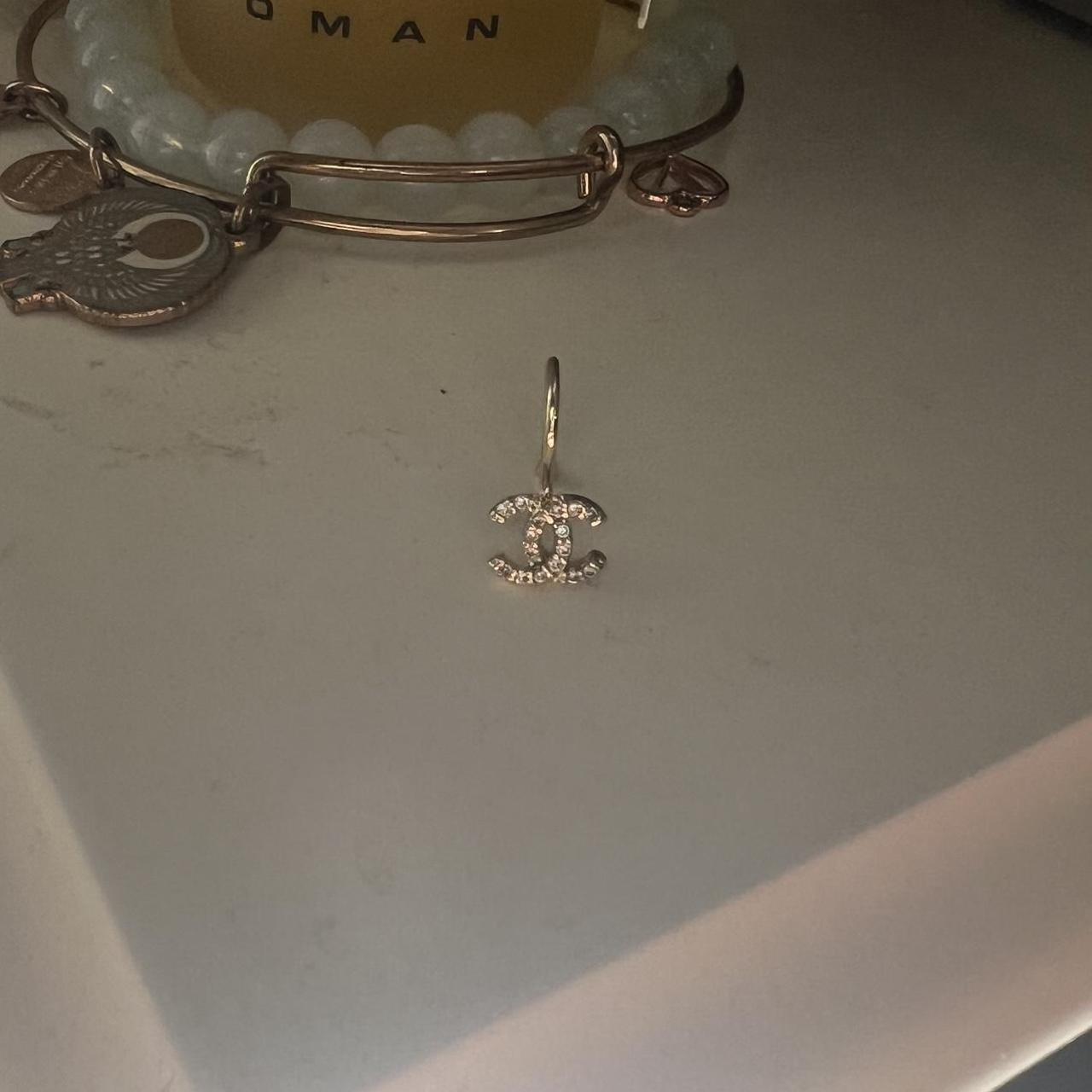 Not worn Chanel symbol false nose piercing. - Depop