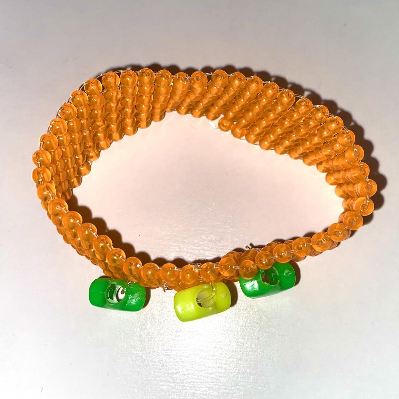 Bright neon orange kandi cuff bracelet made of small... - Depop