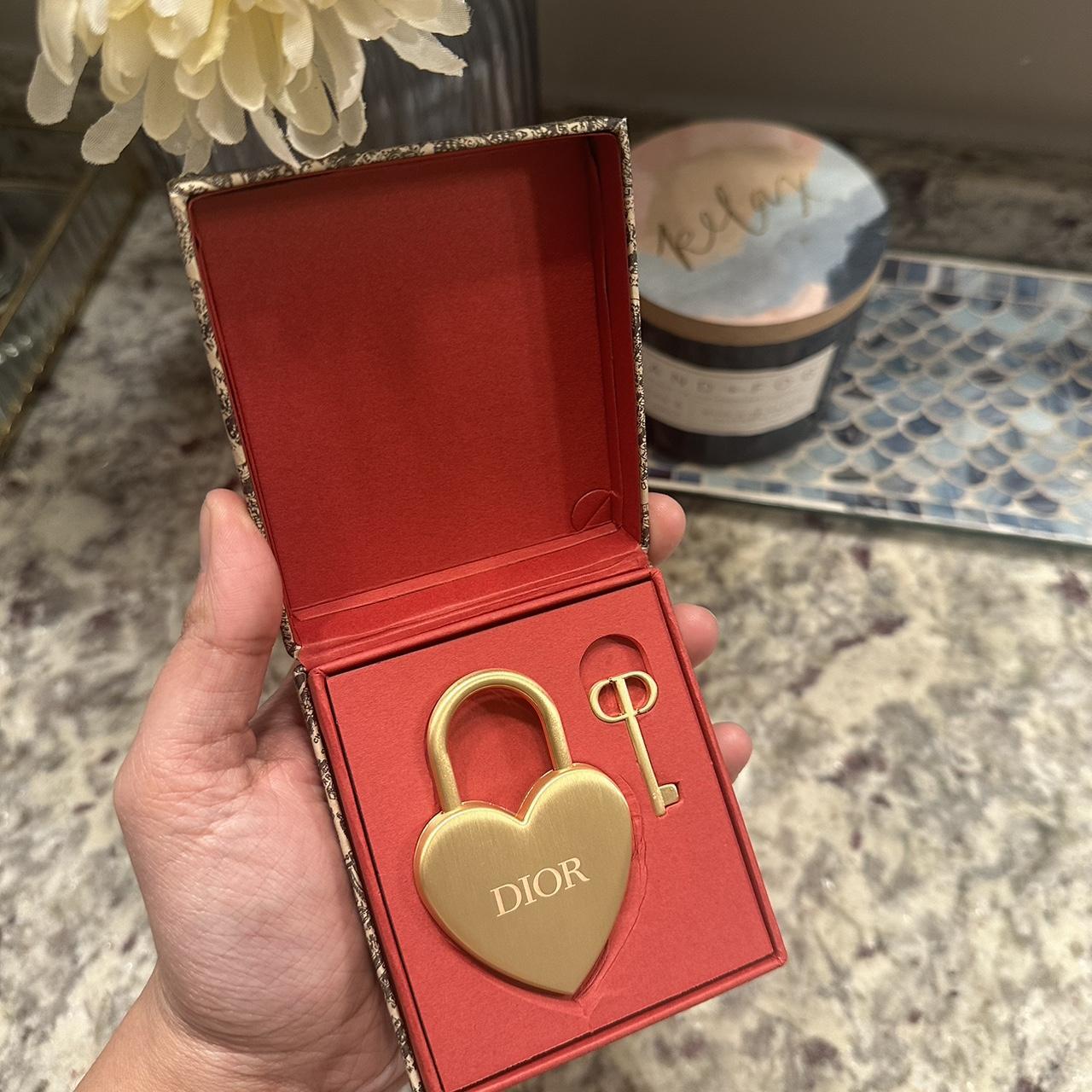 Dior lock and key. Comes with box. Like new... - Depop
