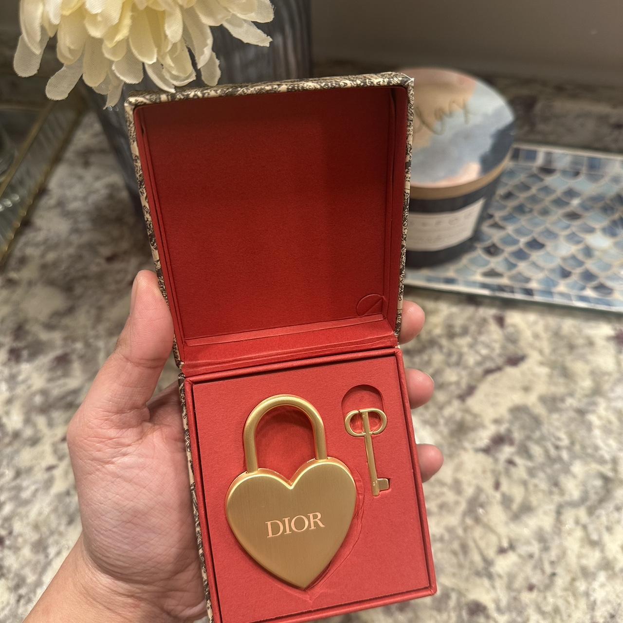 Dior lock and key. Comes with box. Like new... - Depop