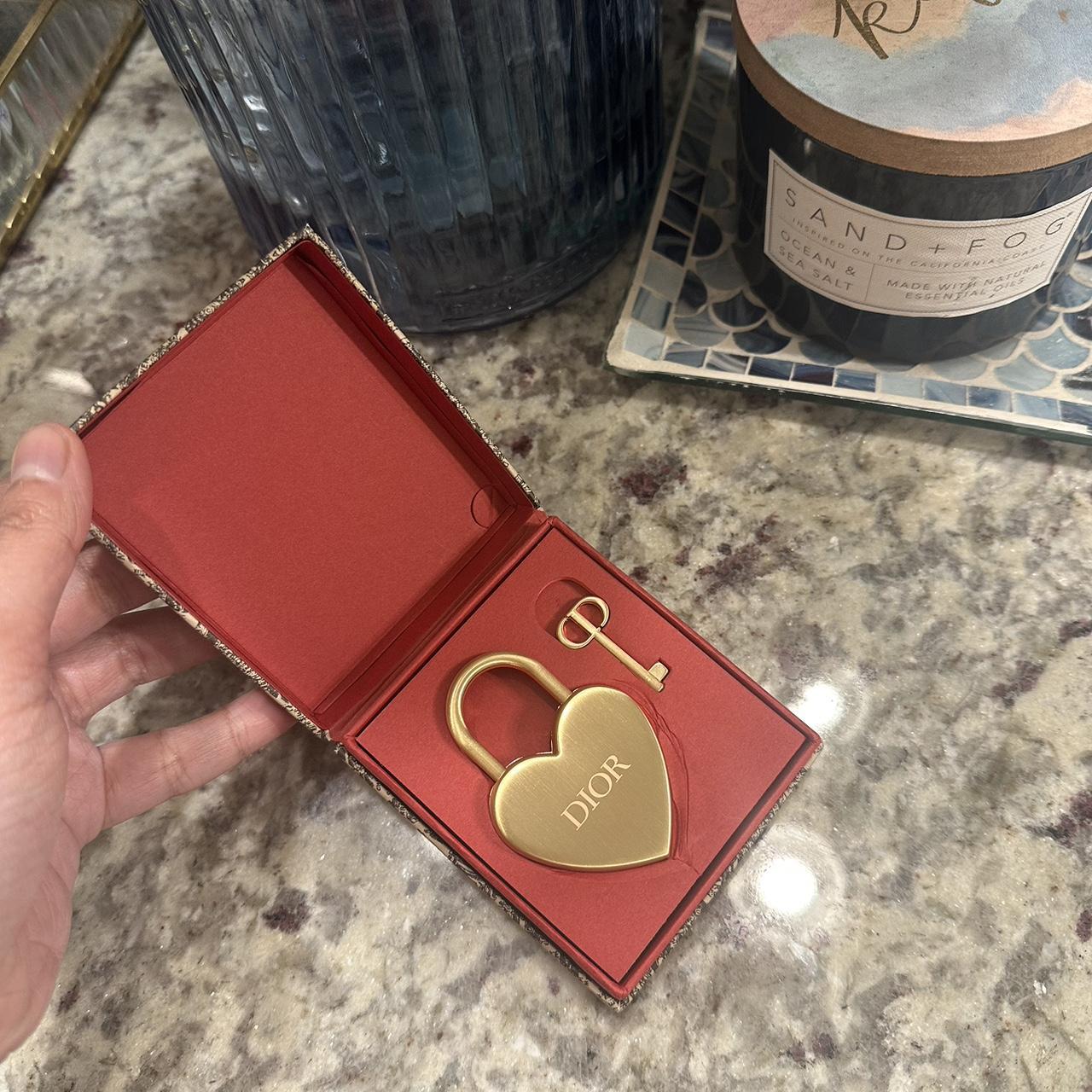 Dior lock and key. Comes with box. Like new... - Depop