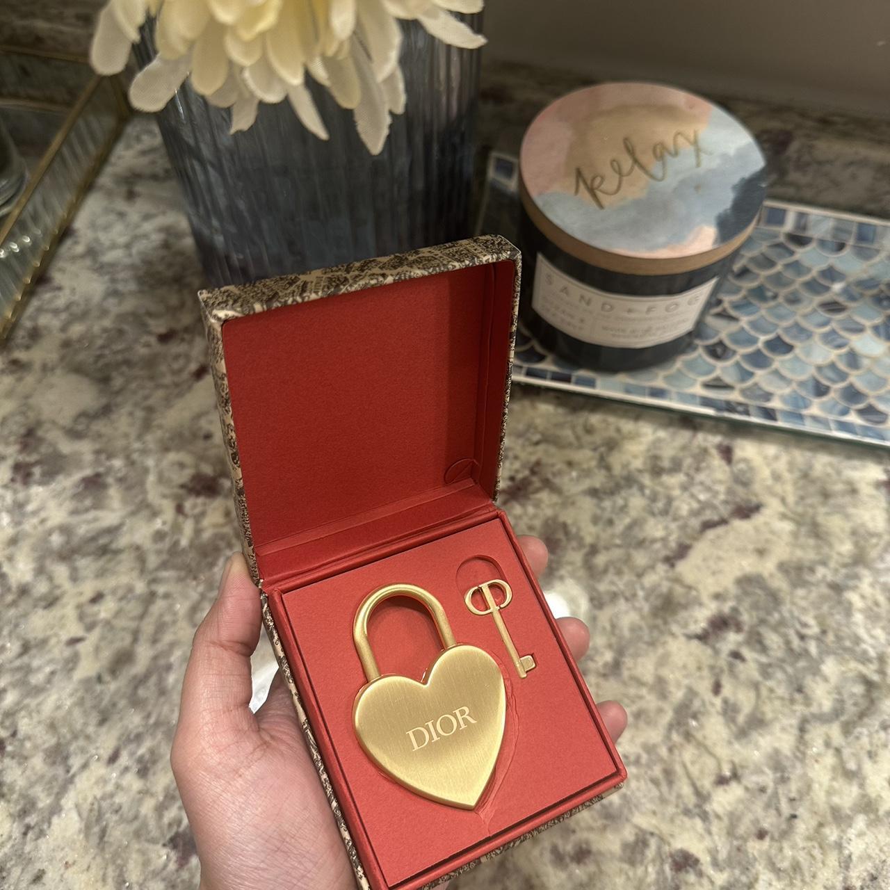 Dior lock and key. Comes with box. Like new... - Depop