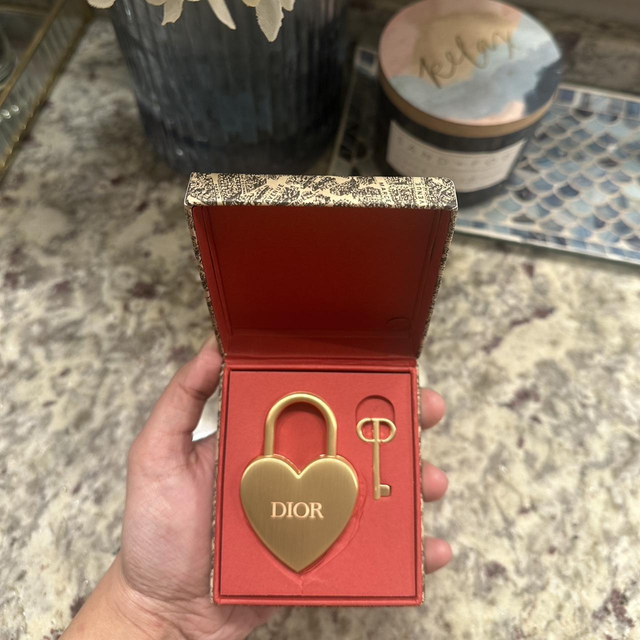 Dior lock and key. Comes with box. Like new... - Depop
