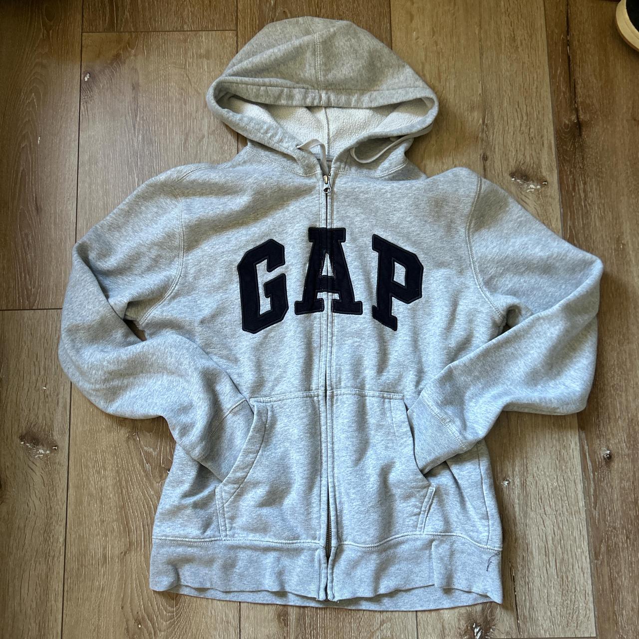 Grey Gap hoodie with black accents, featuring a... | Depop