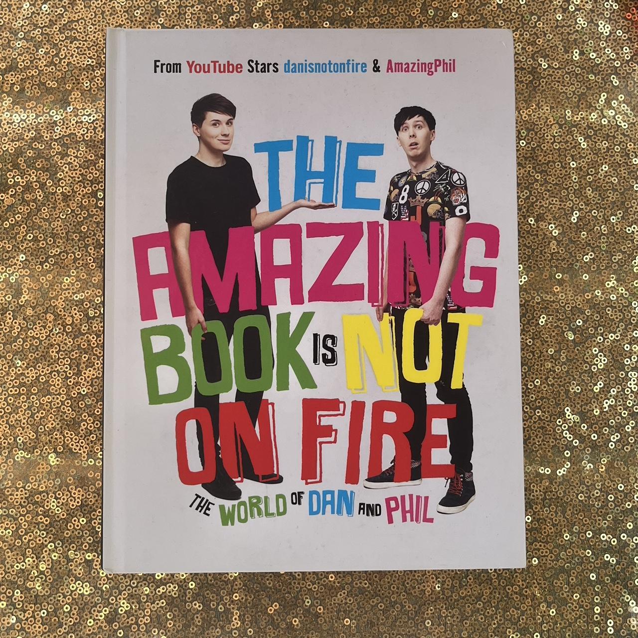 dan and phil the amazing book is not on fire... - Depop