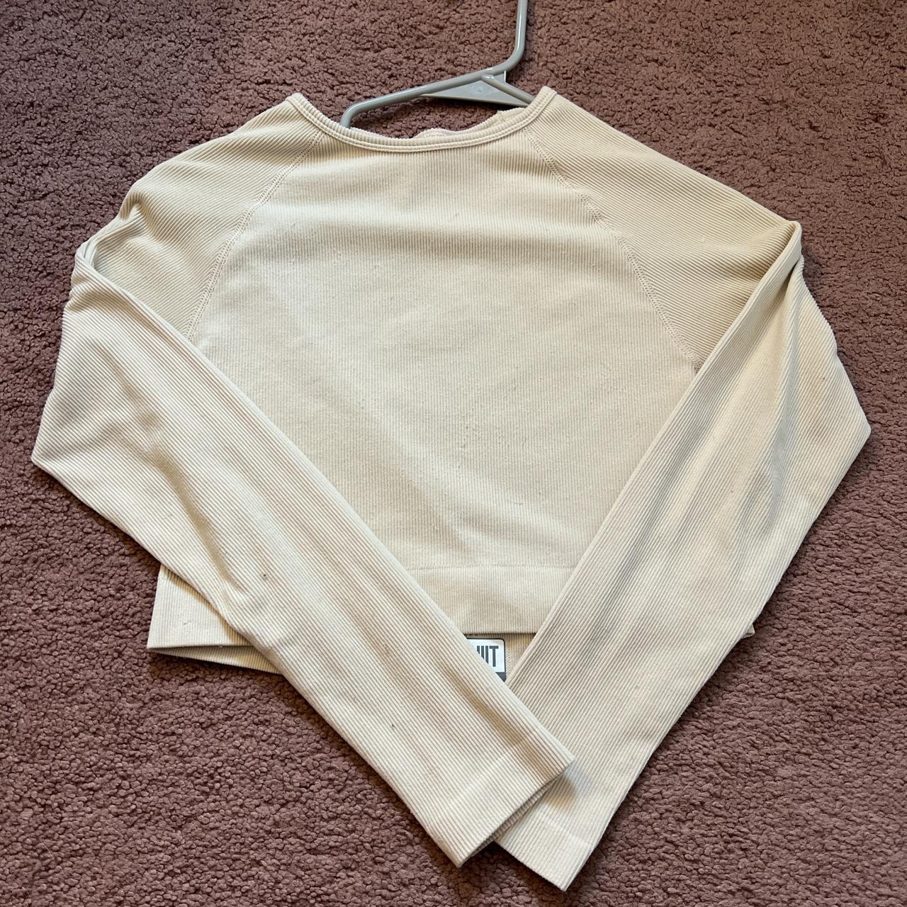Tan, long sleeve crop top. Super comfy to work out... - Depop