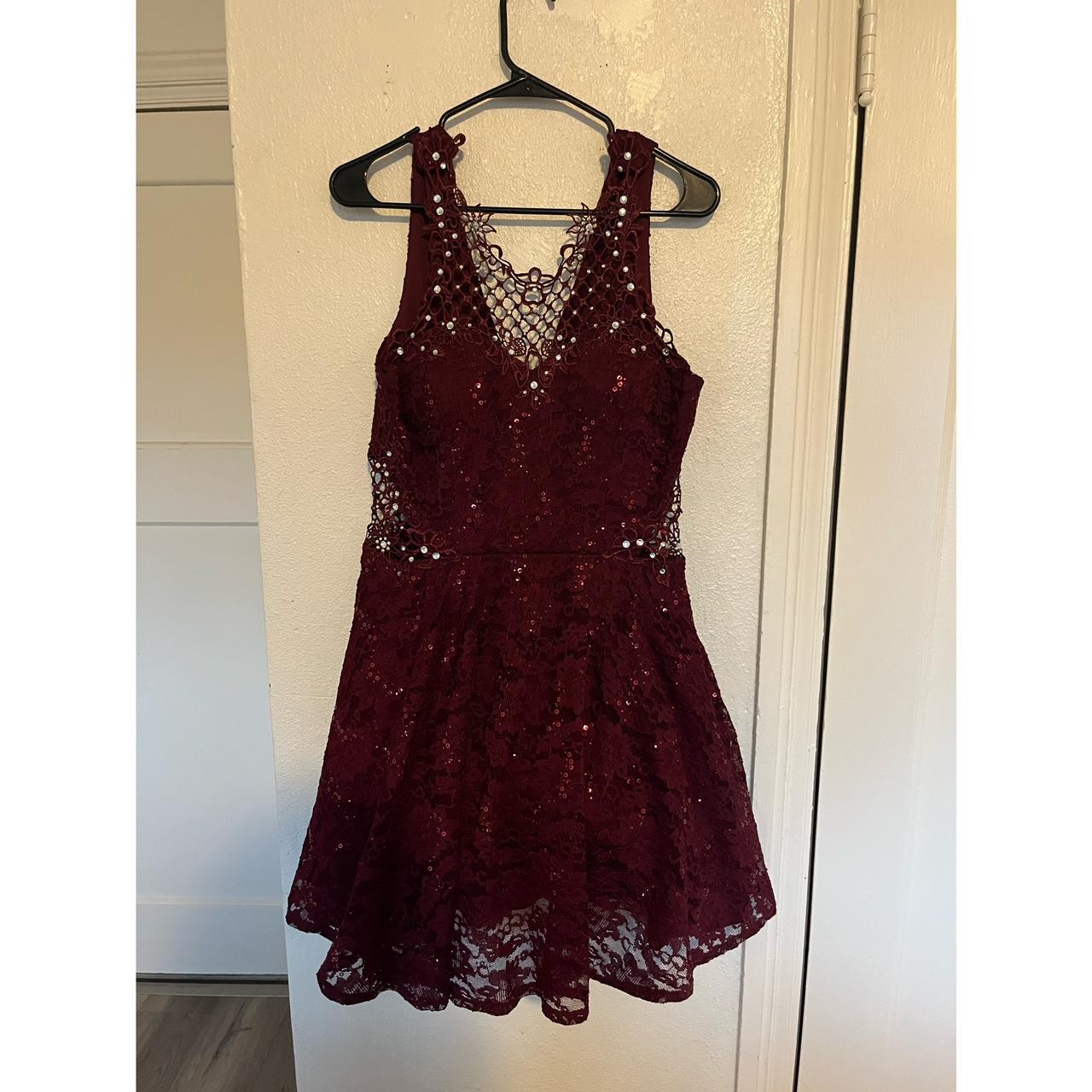 pretty maroon dress. worn a couple times. there is a... - Depop