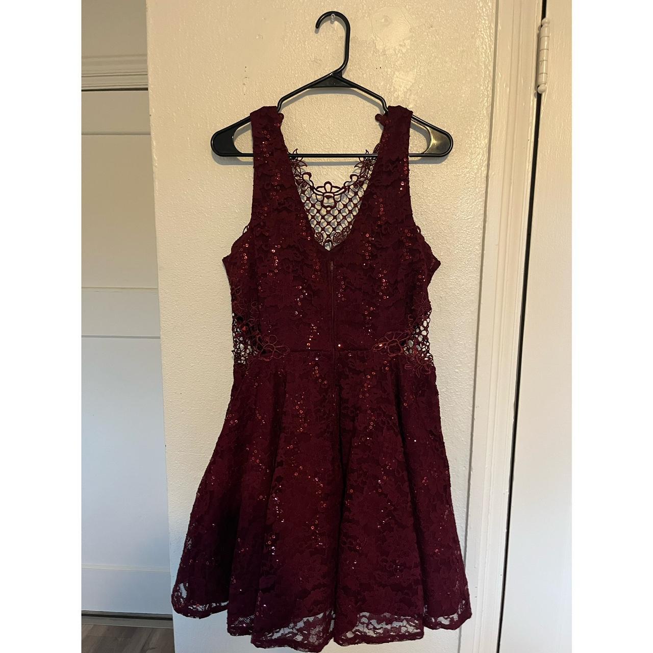pretty maroon dress. worn a couple times. there is a... - Depop