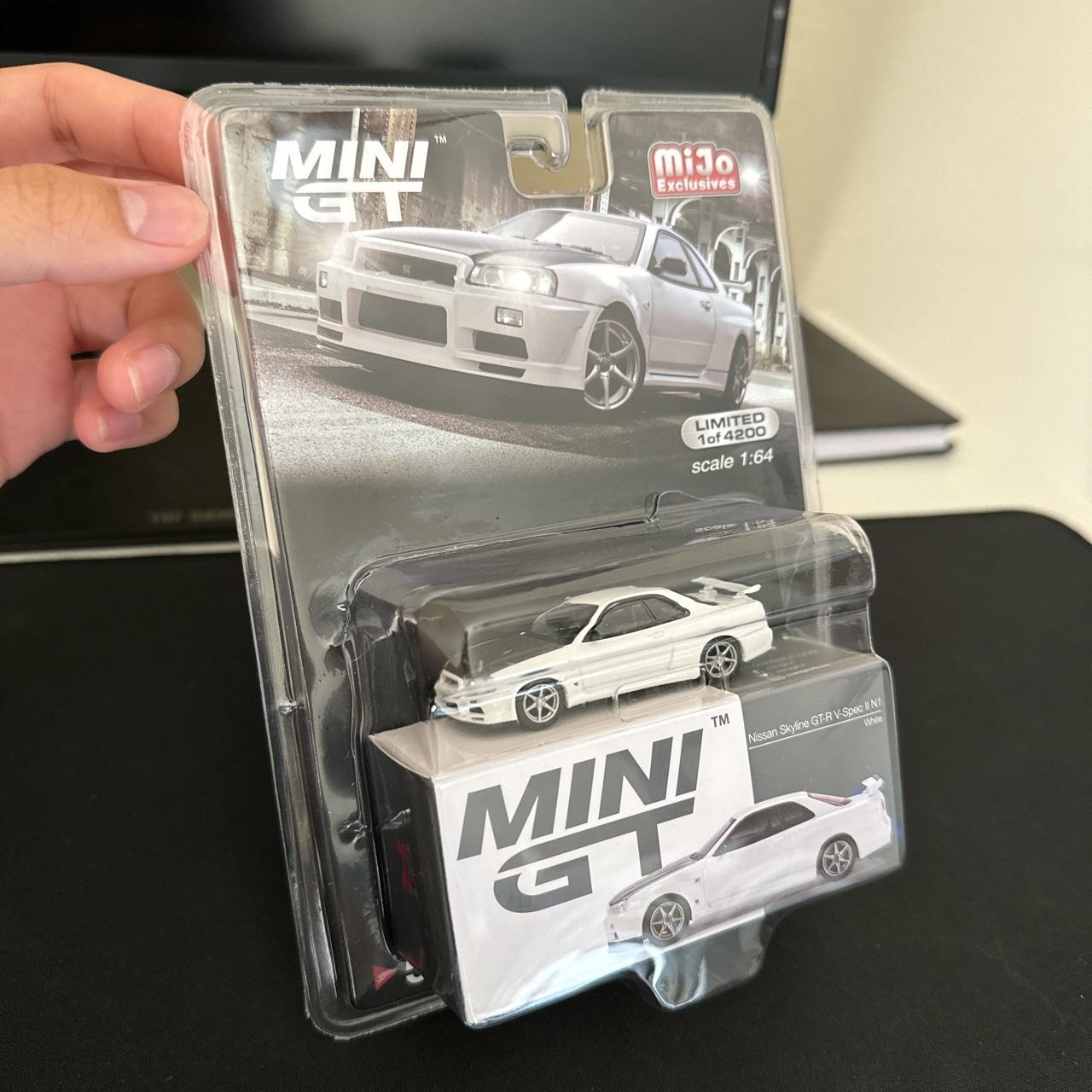 Nissan R34 GTR Mini GT collectible In great... - Depop