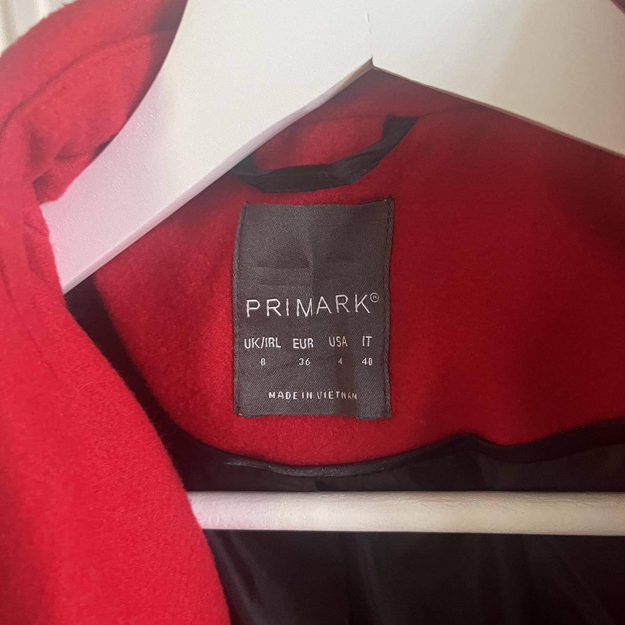 Primark beautiful red long coat with black buttons... - Depop