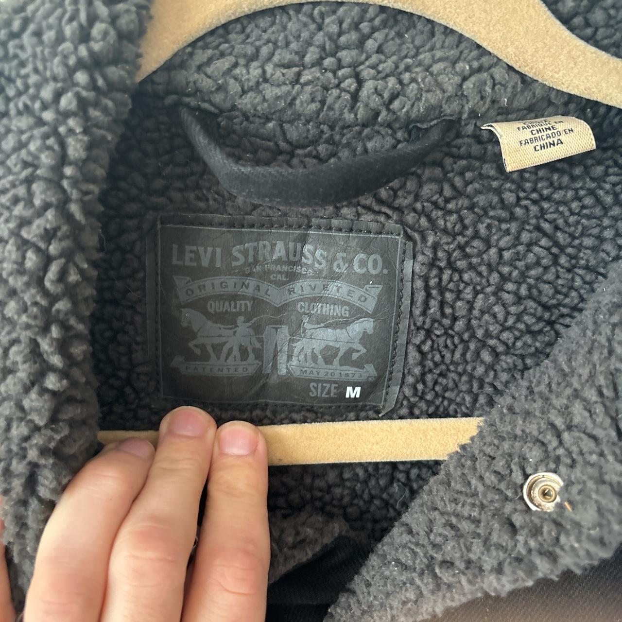 Levi’s black denim shearling jacket. Very cozy.... - Depop