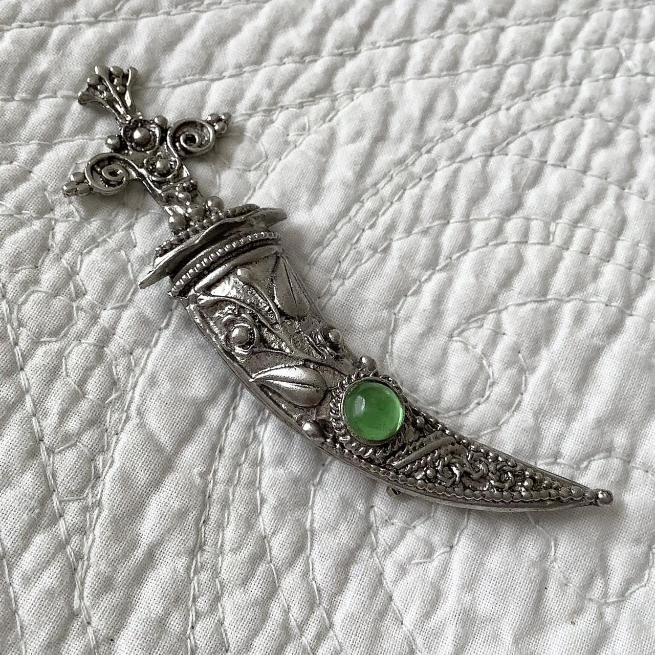Vintage 80s Silver-tone embossed dagger pin with... - Depop