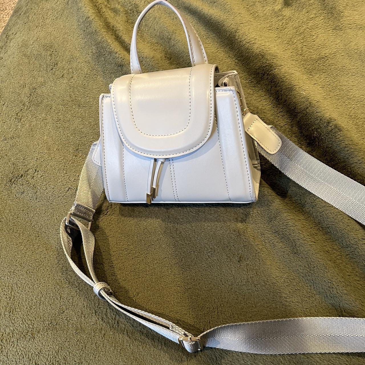 Small gray Zara purse. Has a handle, removable cross... - Depop