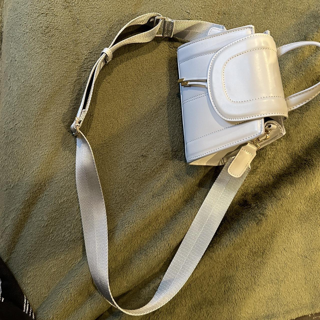 Small gray Zara purse. Has a handle, removable cross... - Depop