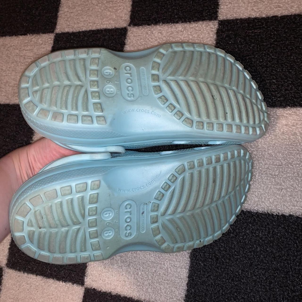 Light blue crocks with free jibbitz charms... - Depop