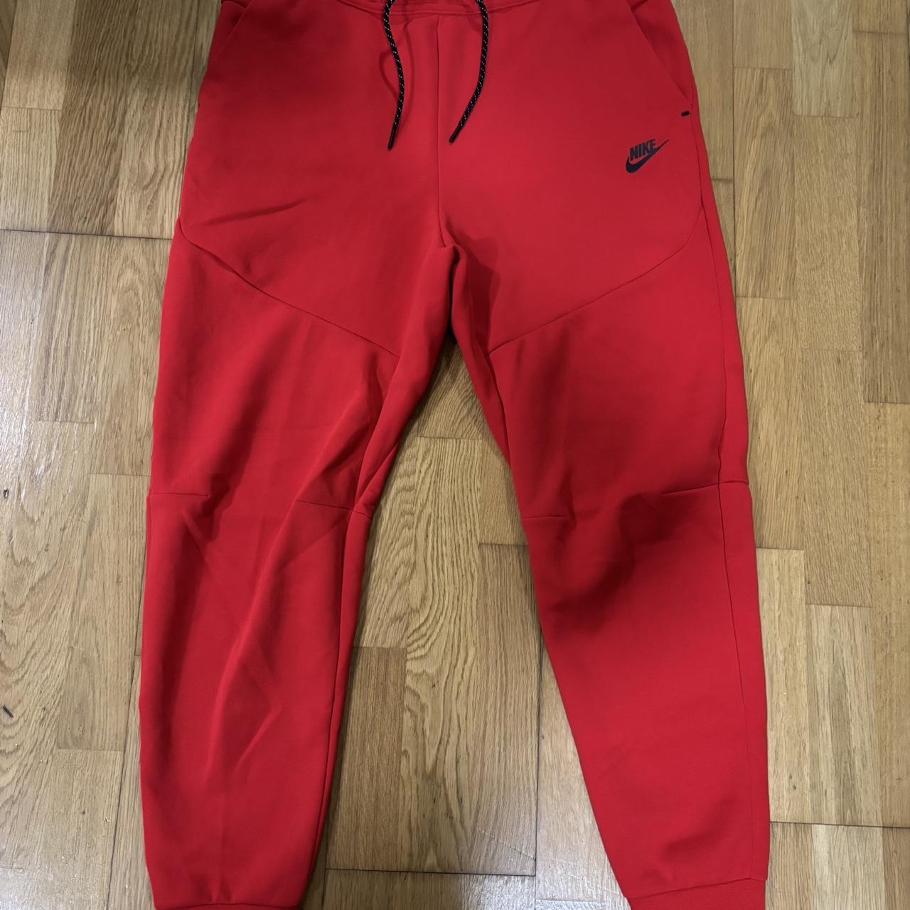 Tuff red nike tech pants Good condition #nike... | Depop