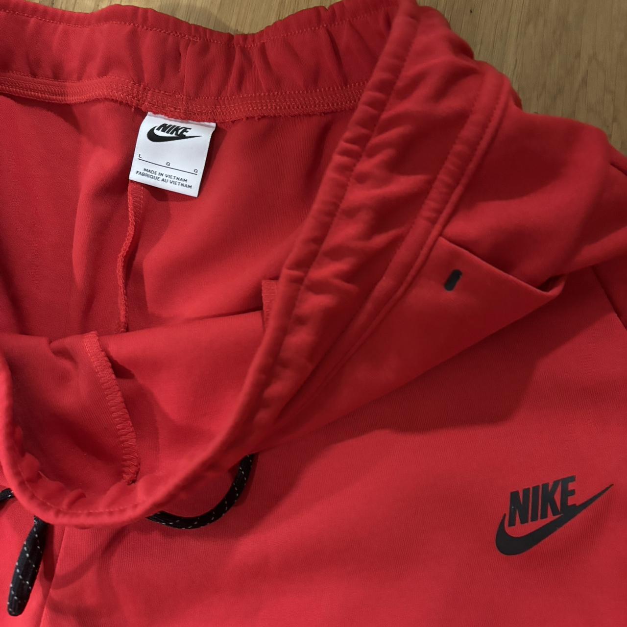 Tuff red nike tech pants Good condition #nike... | Depop