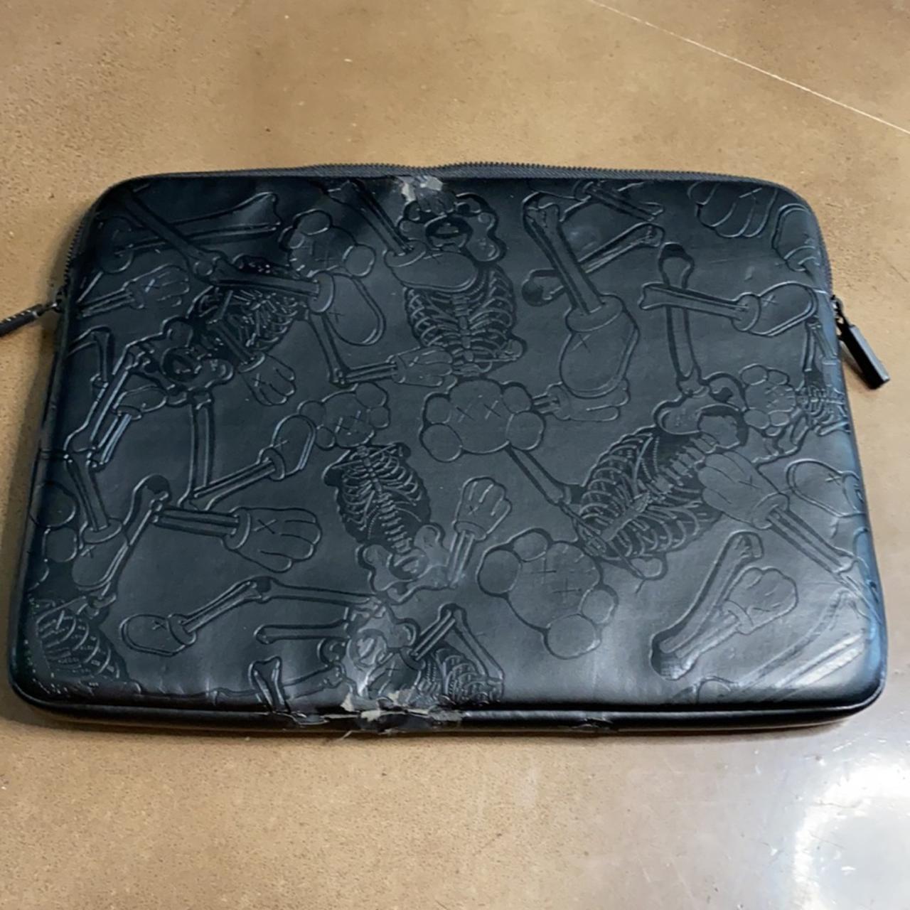 Kaws Laptop Case Case is cracking due to age. 7/10... - Depop