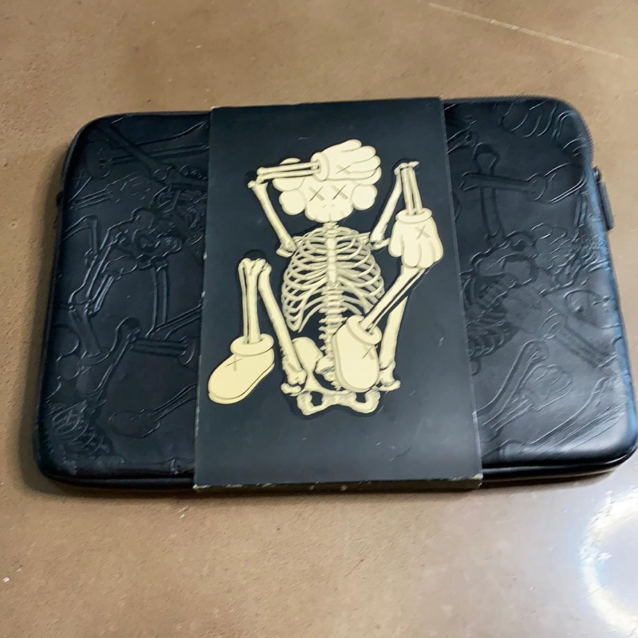Kaws Laptop Case Case is cracking due to age. 7/10... - Depop