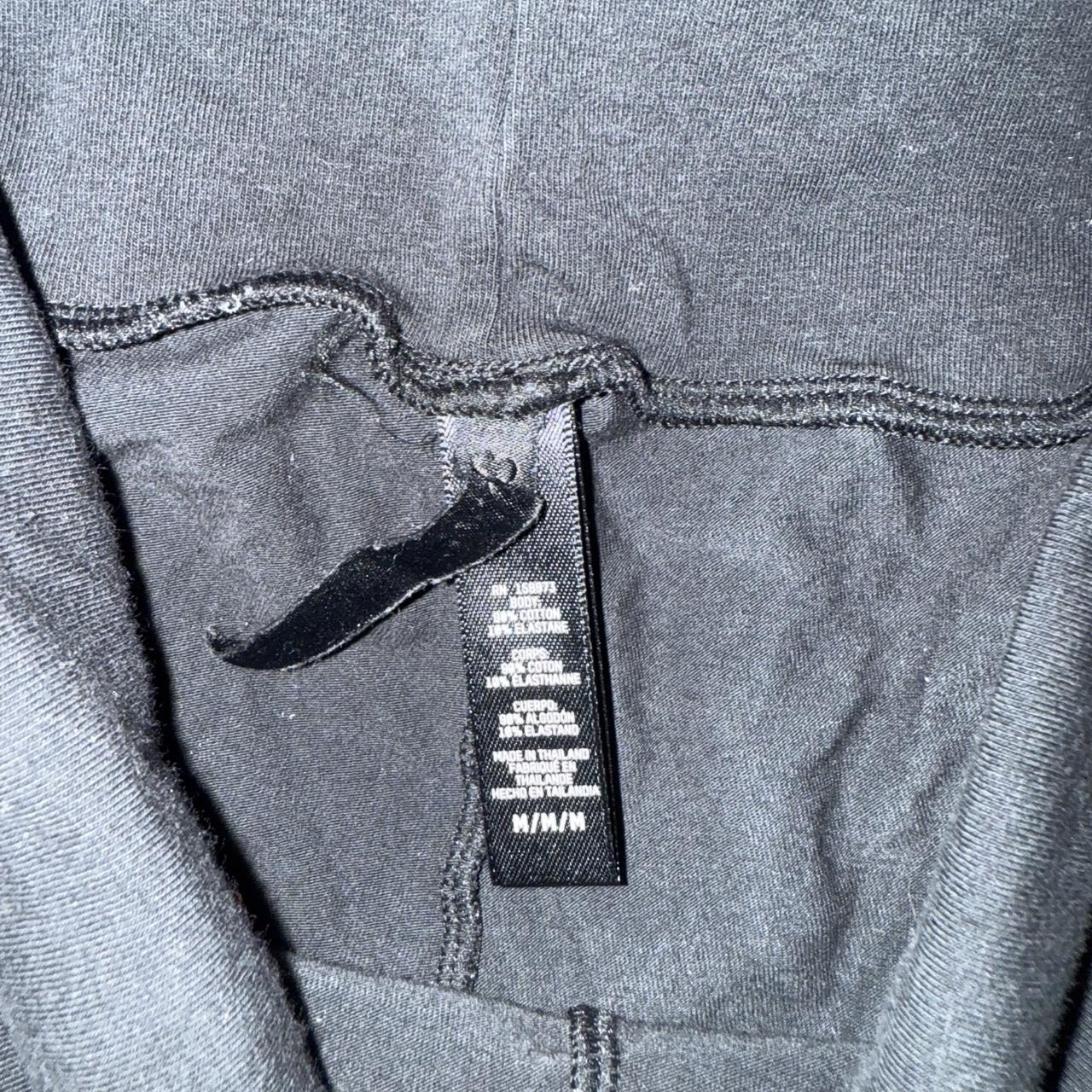 skims black flare fold over leggings size medium | Depop