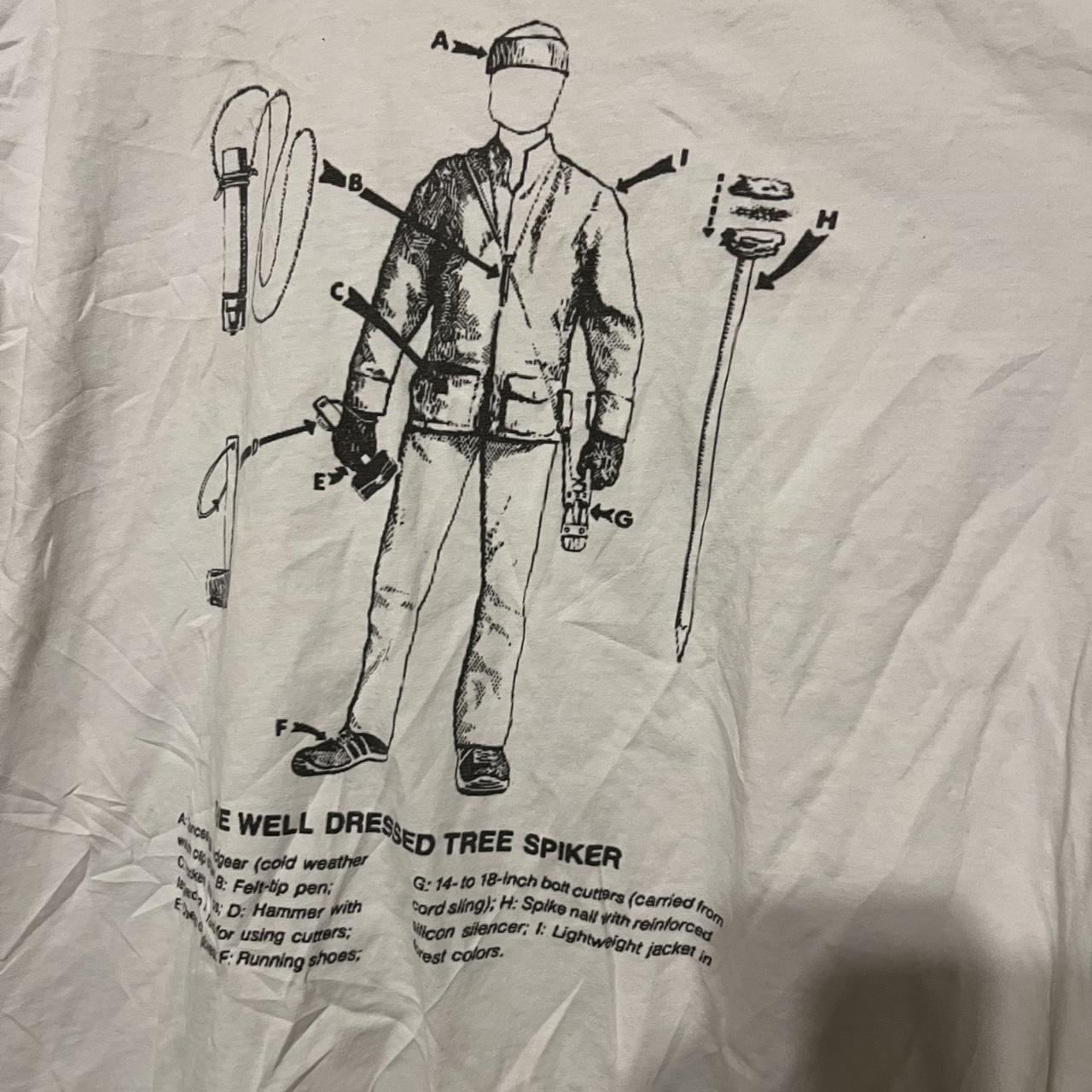 White "The Well Dressed Tree Spiker" XL cotton... | Depop