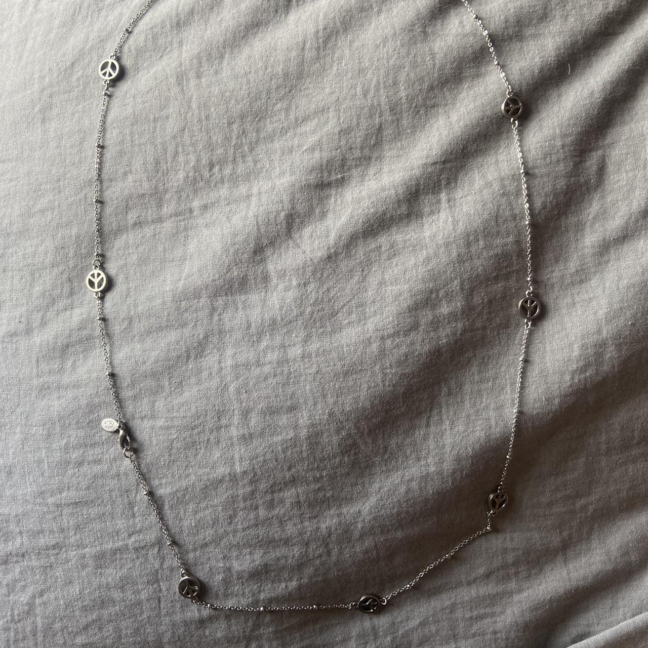 the cutest long peace sign chain... - Depop