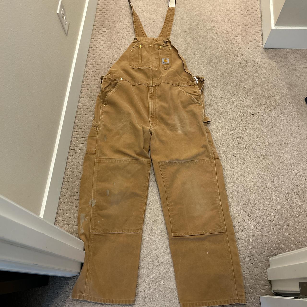 Tan Carhartt overalls -size 42 x32 -minor stains... - Depop