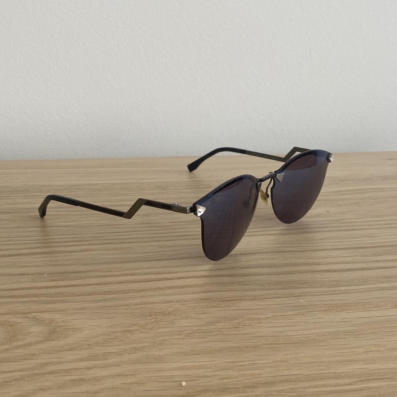 Fendi aviator frameless sunglasses in a blue tint... - Depop