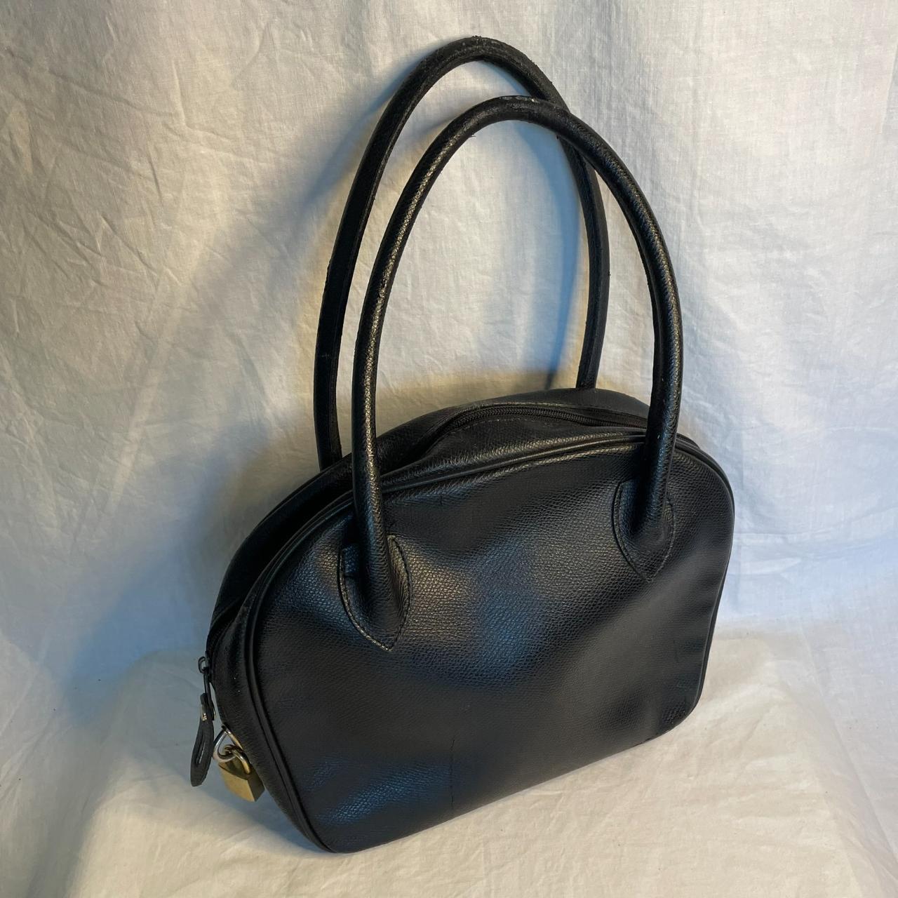 Black bag with key lock Bag can be locked, key and... - Depop