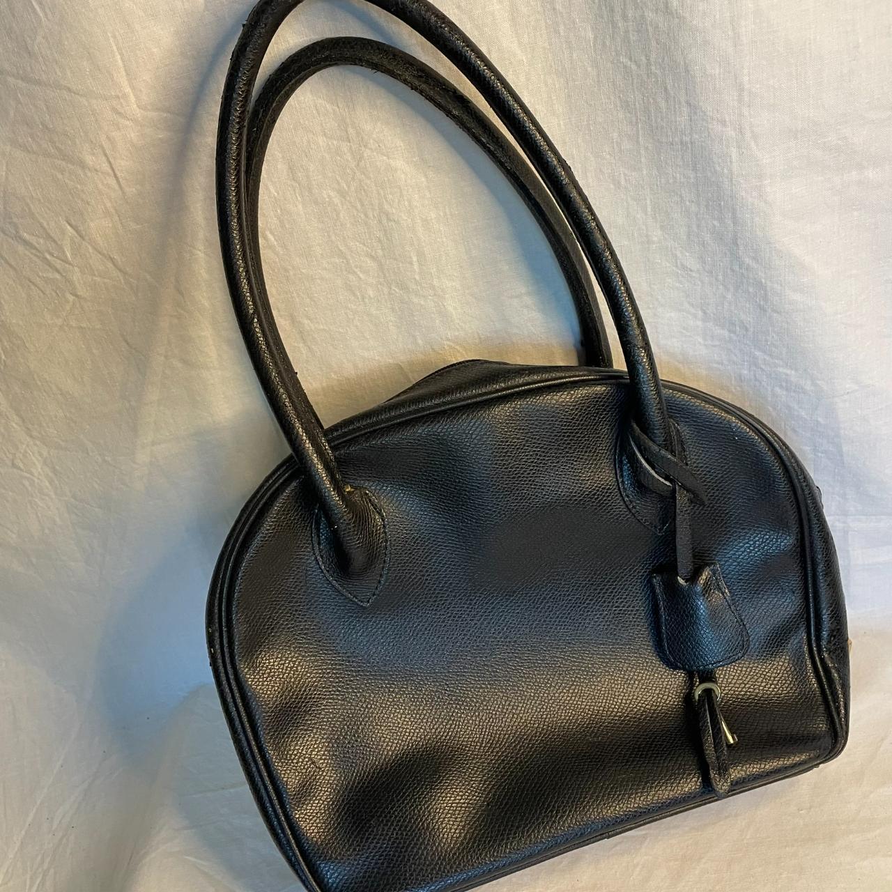 Black bag with key lock Bag can be locked, key and... - Depop