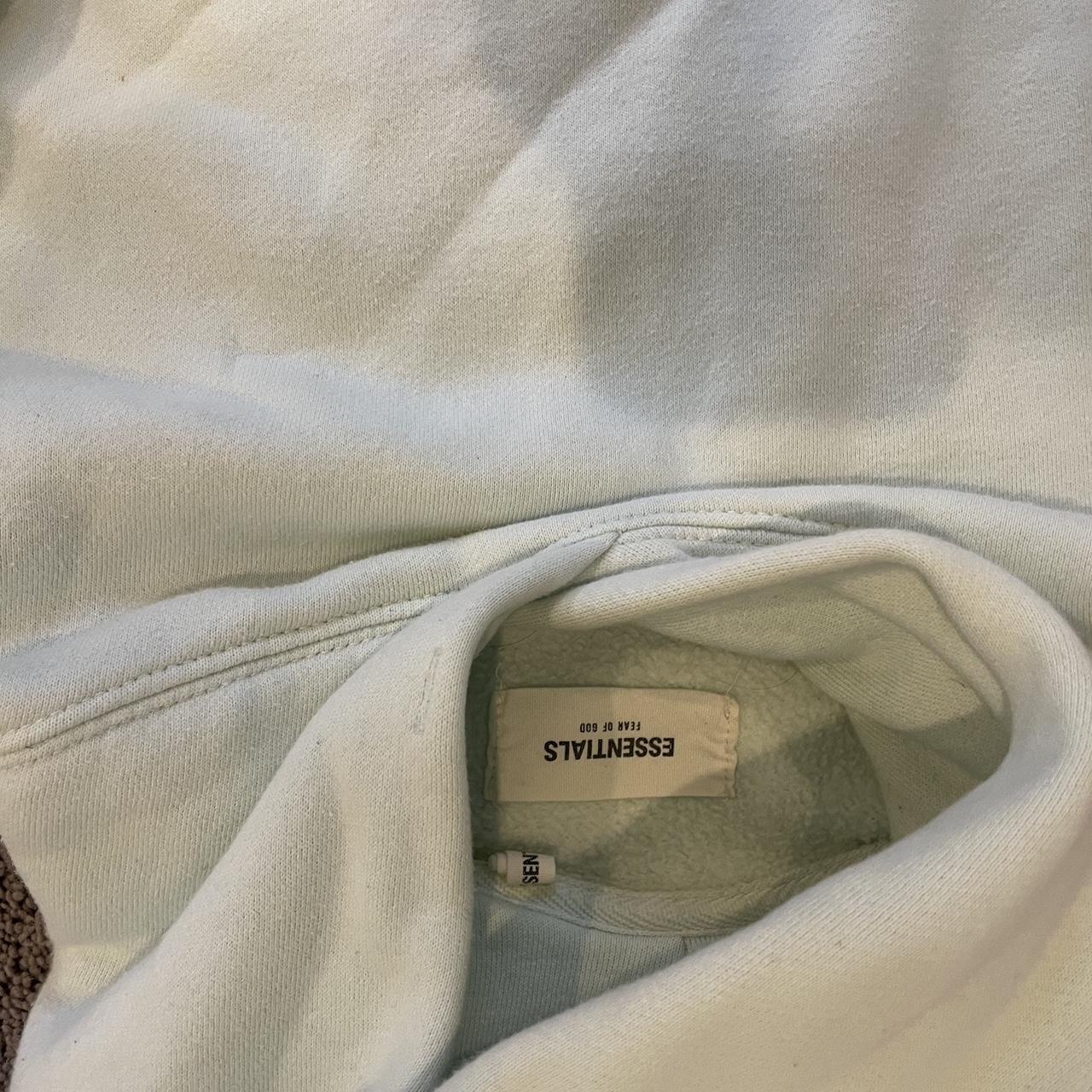 Essentials light blue hoodie from the UK collection | Depop