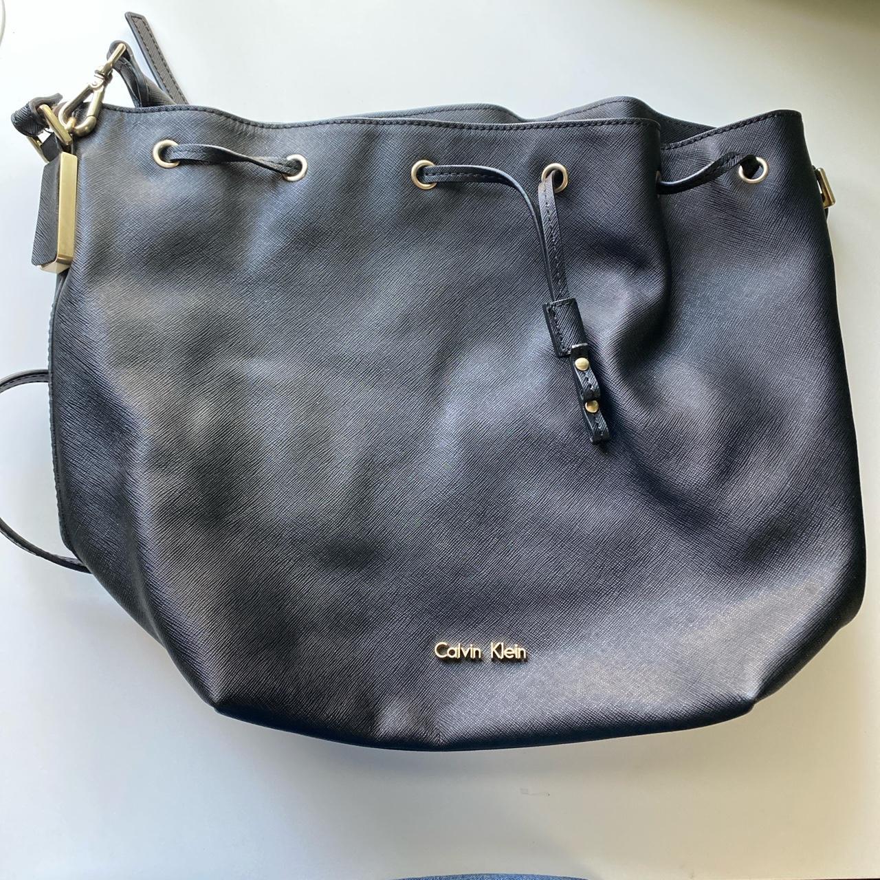 Calvin Klein black drawstring bag with crossbody... - Depop
