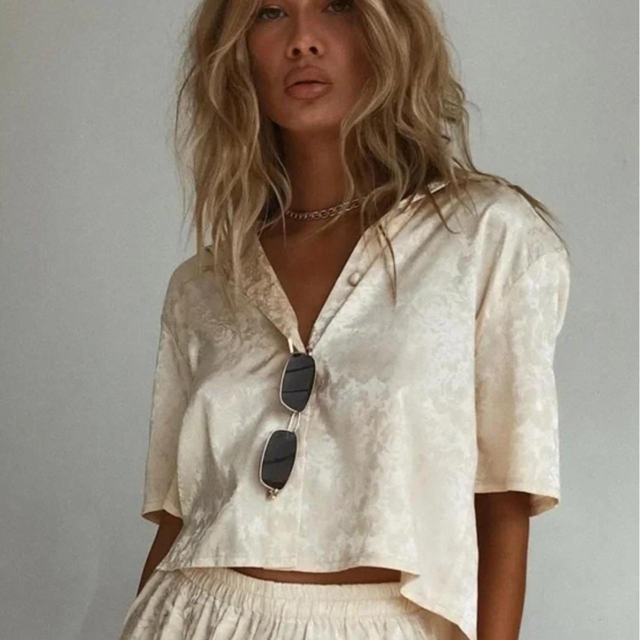 Beautiful gold button up blouse. Label has since... - Depop