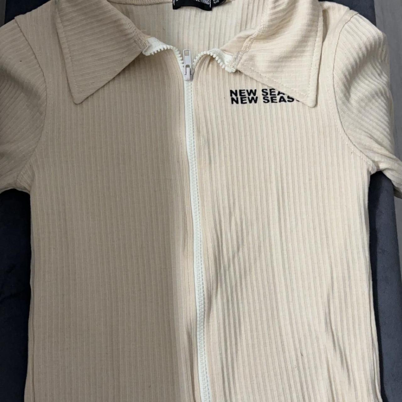 -cream zip up top -worn once/ like new -message... - Depop