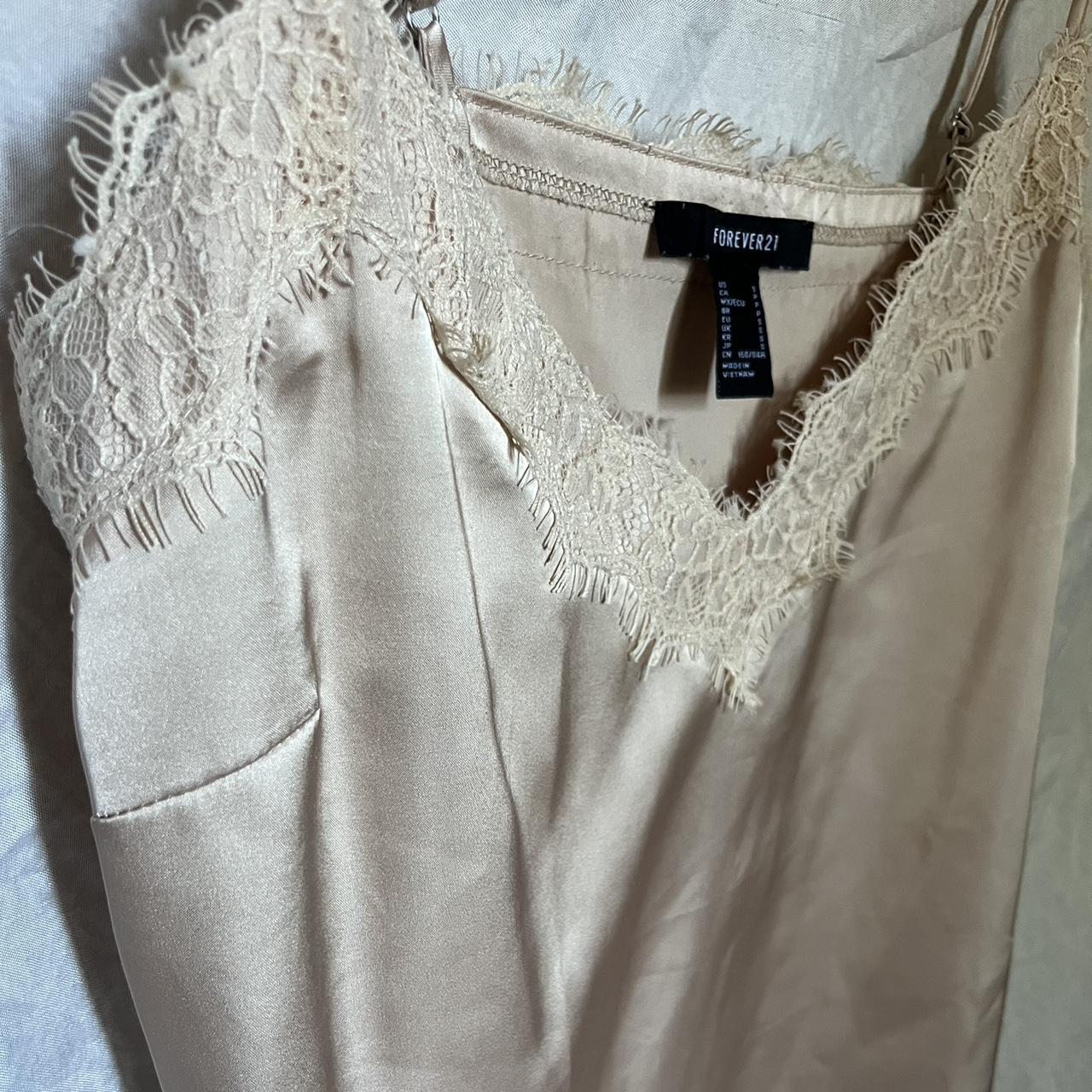gorgeous silky cream cami top with lace edge. so... | Depop