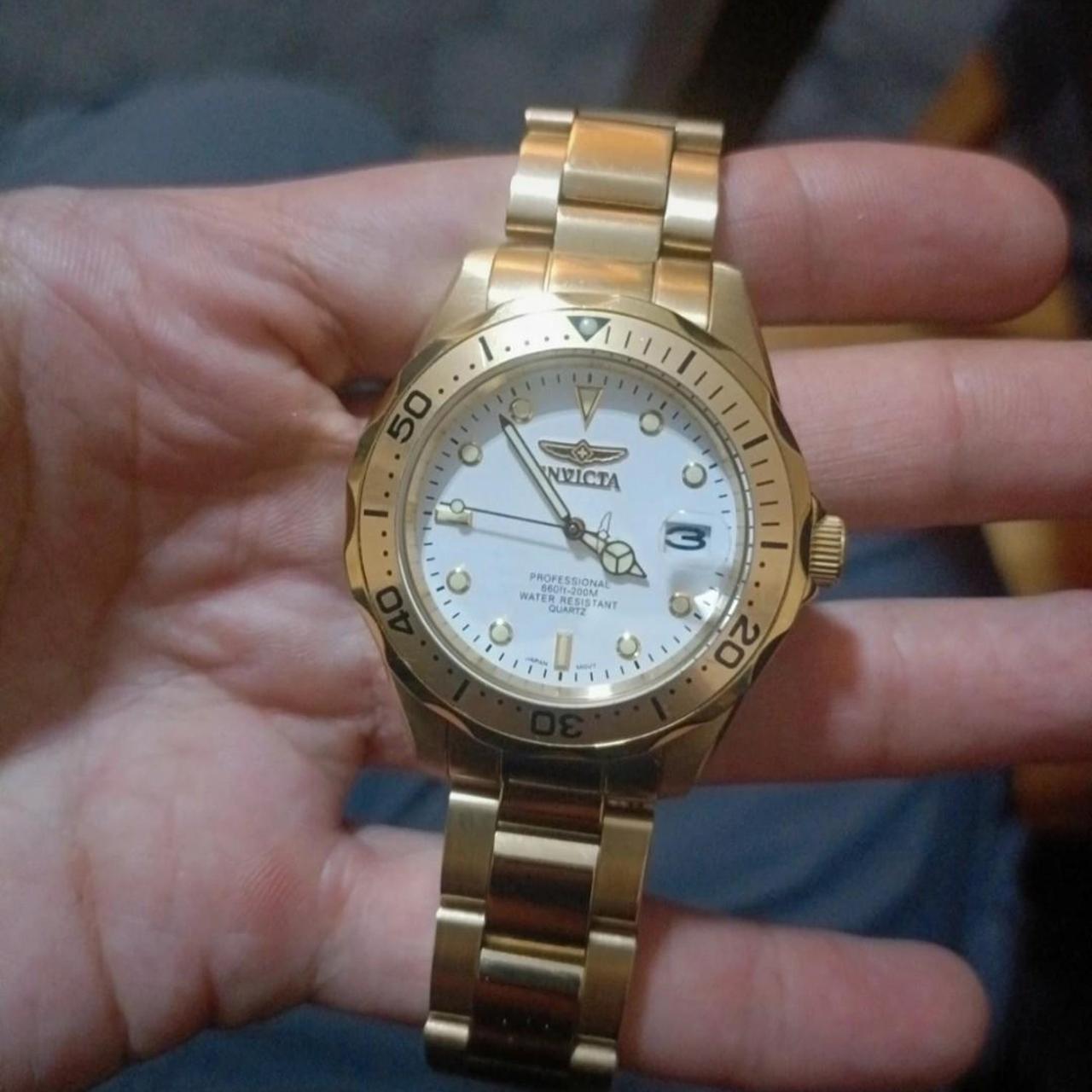 Gold and white Invicta watch quartz movement... | Depop