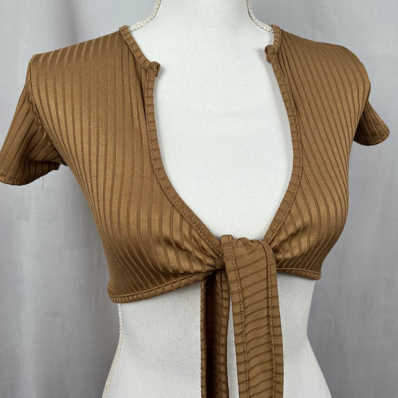 Ribbed, camel colored front- tie, crop top featuring... - Depop