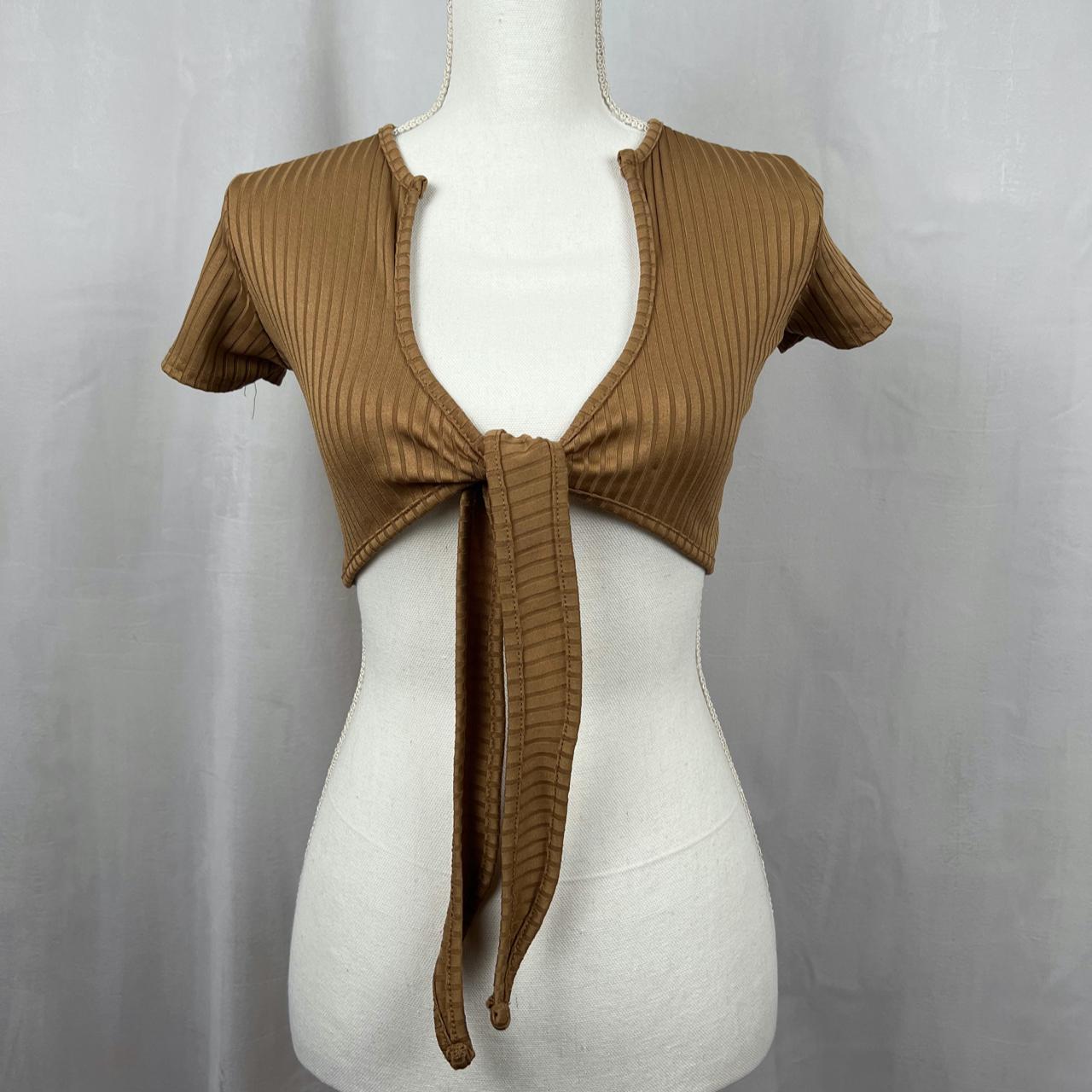 Ribbed, camel colored front- tie, crop top featuring... - Depop