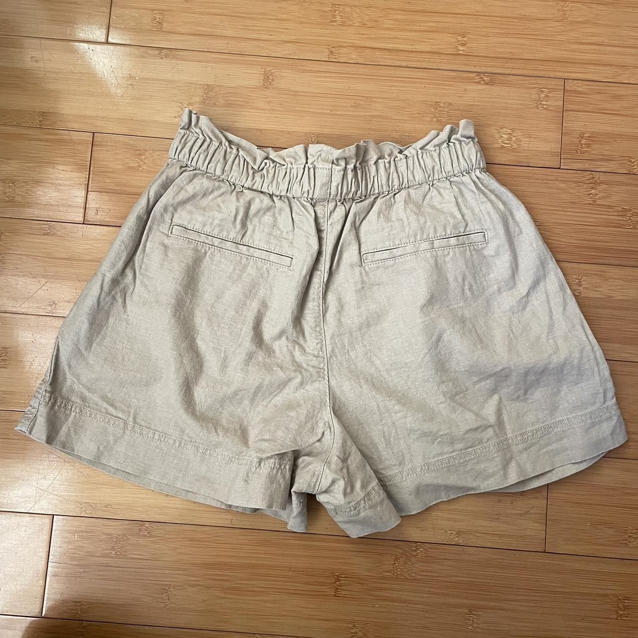 Uniqlo khaki shorts adjustable strings. front and... - Depop