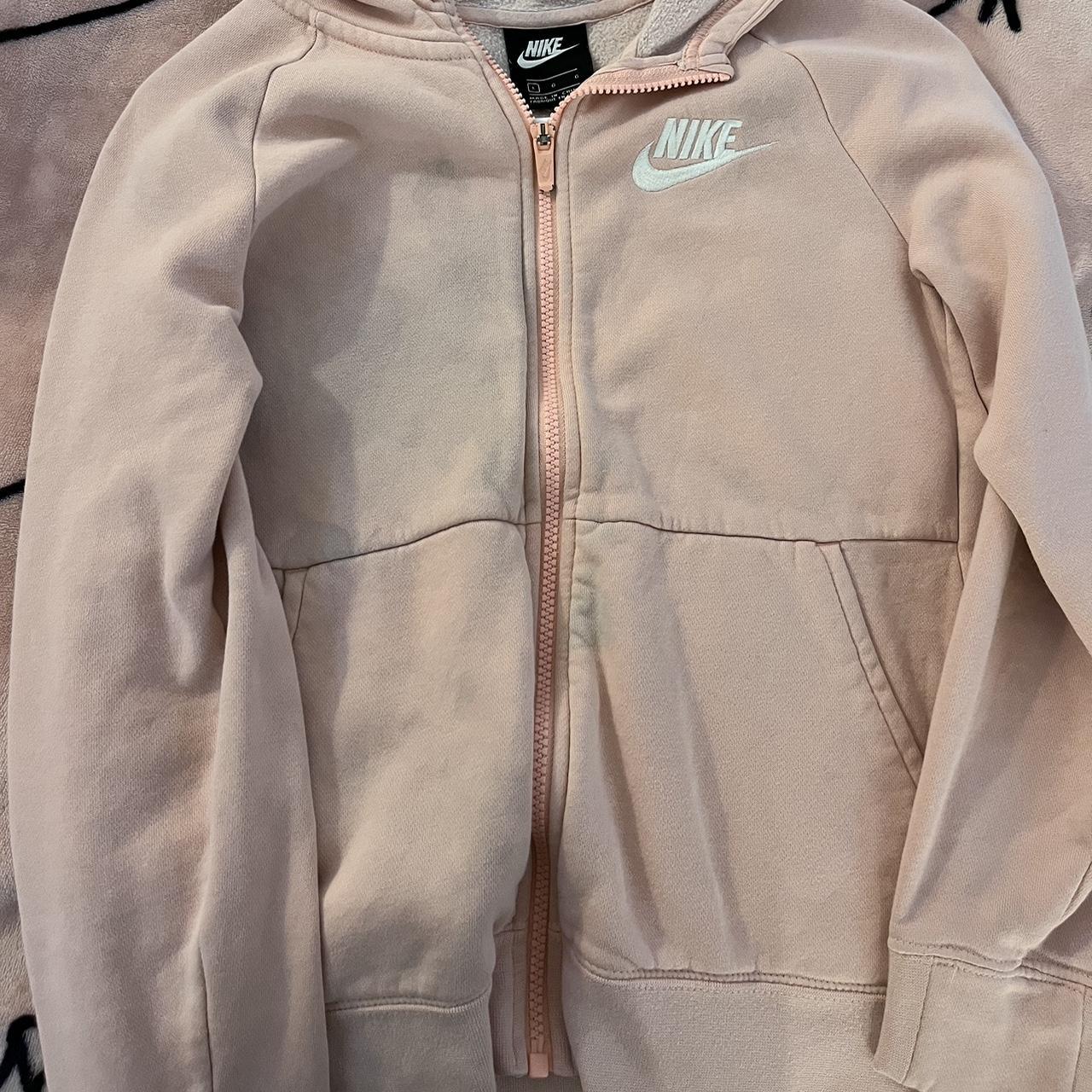 Pink Nike jacket has a lil bit of stains on it but... - Depop