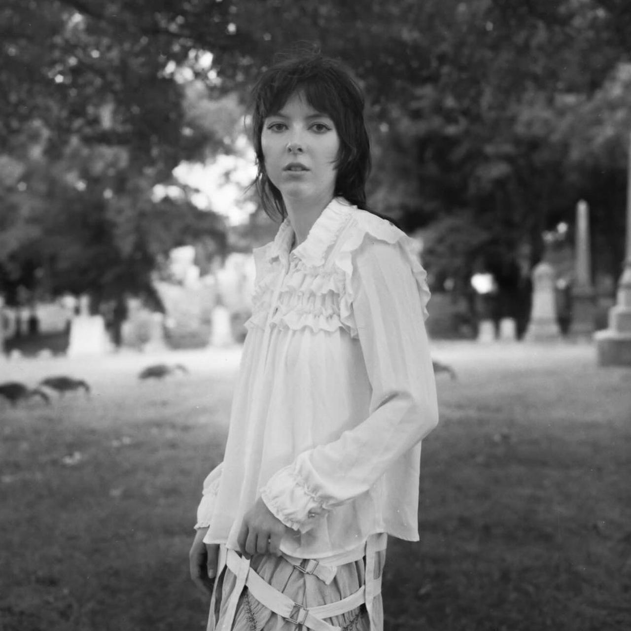 Cream ruffle blouse with button up front, featuring... - Depop