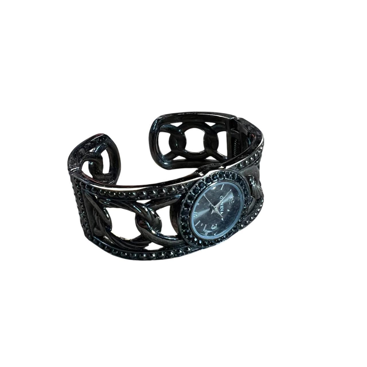 Such a cute accessory! Here's a metal cuff watch by... - Depop