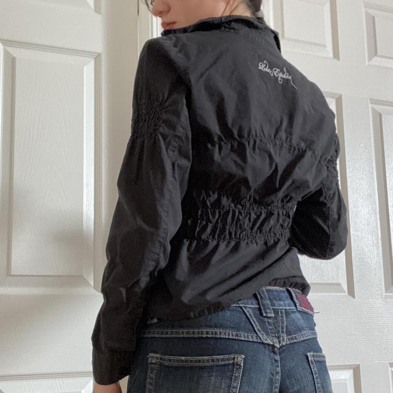 Flattering cinched black button up top. Not cop... - Depop